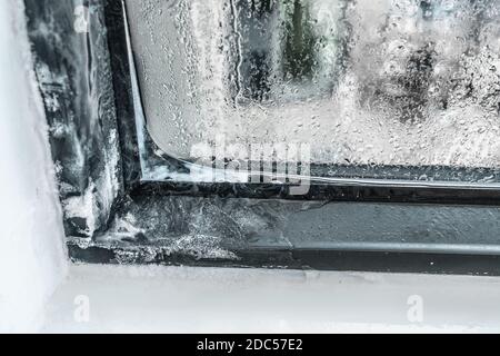 Ice and condensation forming on a window Stock Photo - Alamy