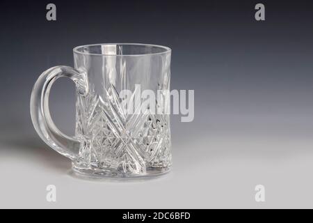 Still life Glass Tankard on a graduated backdrop Stock Photo - Alamy