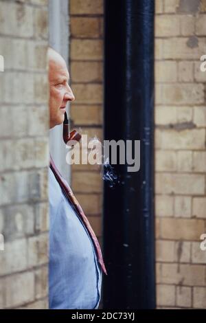 Male pipe smoker, England, UK Stock Photo - Alamy