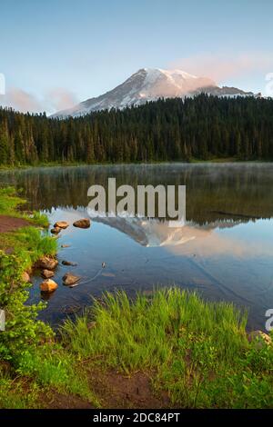 Mountains, lakes and the early morning fog .beautiful landscape in ...