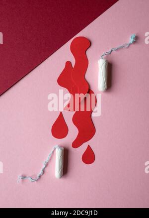 Menstrual period concept. Woman hygiene protection. Cotton tampons on ...