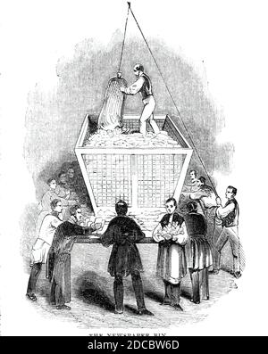 Worker sorting newspapers at Post Office, New York City, New York, USA ...