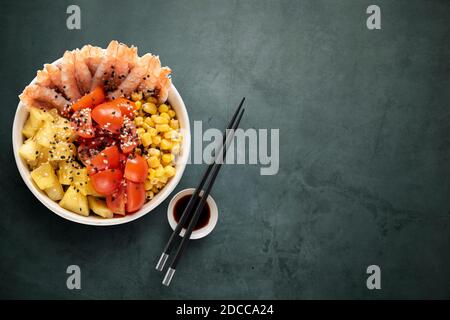 Poke bowl with shrimps, avocado and mango. Traditional hawaiian meal ...