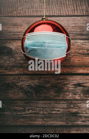 Medical protective masks on a Christmas background with Christmas ...