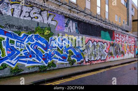 Bright colourful graffiti including work by Décor, Tizer and Snag, on ...