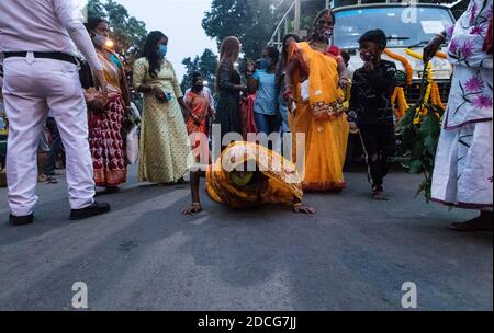 Women doing prostration march after day long fasting and abstaining ...