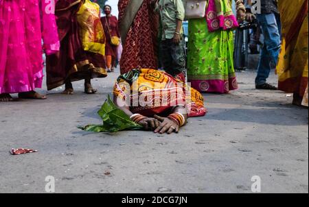 Women doing prostration march after day long fasting and abstaining ...