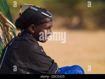 Portrait of a Gabra tribe woman wearing the traditional headwear ...