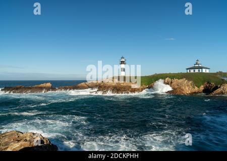 View of the lighthouse on Isla Pancha in Galicia Stock Photo - Alamy