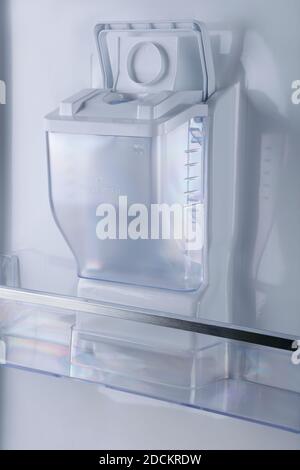 Water dispenser inside the refrigerator Stock Photo - Alamy