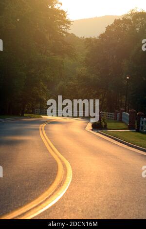 A two-lane divided road in Virginia's countryside, USA Stock Photo - Alamy