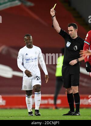Referee Chris Kavanagh shows a yellow card to Joachim Andersen of ...
