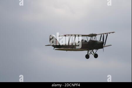 Gypsy Moth biplane in flight Stock Photo - Alamy