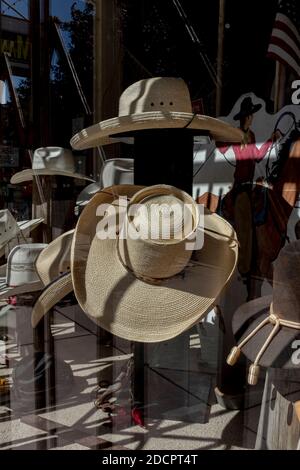 storefront detail (behind the gate) of "The Man's Hat Shop" in ...