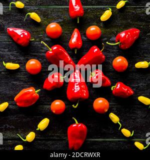 Healthy organic food. A top shot of pollen and a jar of honey on a dark ...