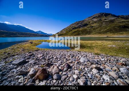 The lake Lago di Montespluga in the valley Val San Giacomo, located ...