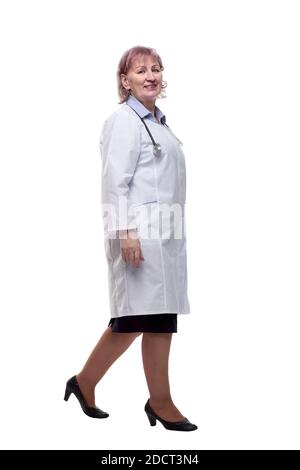 successful woman doctor stepping forward . isolated on white background ...