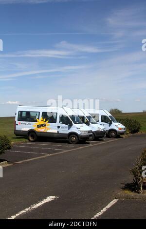 Three Variety Club Iveco mini bus Sunshine coach Stock Photo - Alamy