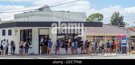 People queuing outside popular Chu Bakery opposite Hyde Park William St ...
