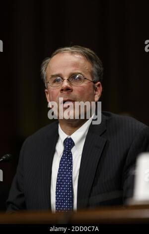 Michael Y. Scudder speaks during his confirmation hearing to become a ...