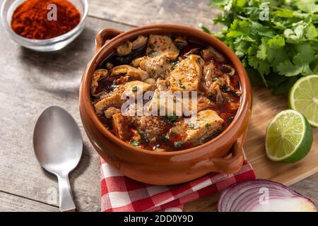 Traditional mondongo or el menudo soup on wooden table Stock Photo - Alamy