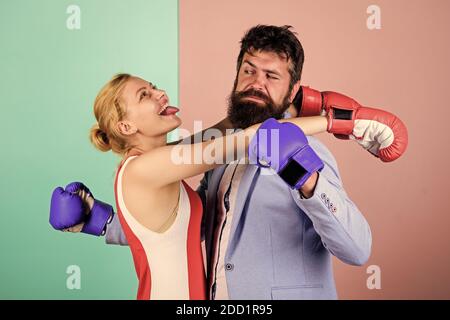 Family life. Boxers fighting gloves. Difficult relationships. Couple in ...