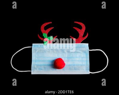 Festive Christmas reindeer made with surgical mask and Christmas ...