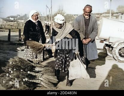Uzbekistan, Vendor And Customers At Stand Selling Peppers Stock Photo ...