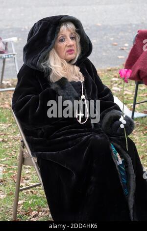 Devout Roman Catholic woman at a service the Vatican Pavilion site in ...