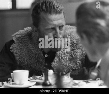 KIRK DOUGLAS on set location candid with snake during break in filming ...