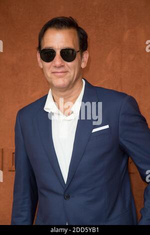 Clive Owen in Village during French Tennis Open at Roland-Garros arena ...