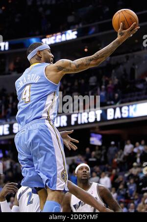 Denver Nuggets forward Kenyon Martin, back, chats with San Antonio ...