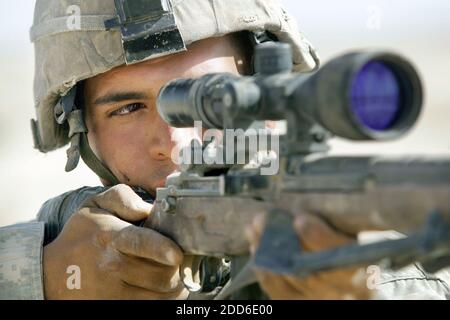 A sniper from the U.S. Army 10th Special Forces Group (Airborne) rests ...