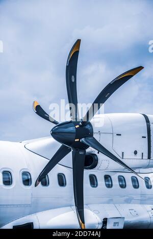 Garuda Indonesia propeller airplane on the tarmac at Labuan Bajo ...
