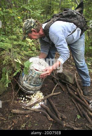 Bear-hunting guide Kelly Shepard of Grand Marais, Minnesota, adds ...