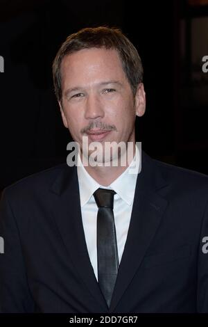 Reda Kateb attending the Freres Ennemis Premiere as part of the 75th ...