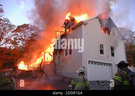 A fire raged at a home owned by rapper 50 Cent on Friday, May 30, 2008 ...