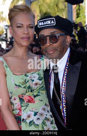 Film Director Spike Lee and his wife Tonya Lewis Lee leave after an ...