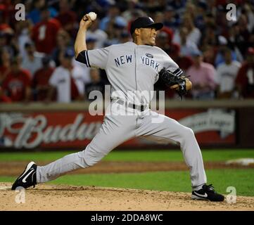 New York Yankees pitcher Max Fried (54) points at umpire John Bacon (70 ...