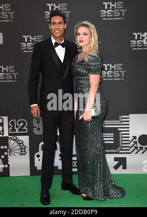 Wife of Raphaël Varane Camille Tytgat and their daughter during France ...