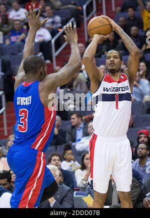 Detroit Pistons guard Rodney Stuckey, left, drives to the basket past ...
