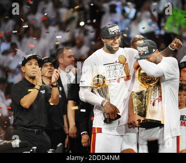 The Miami Heat's Dwyane Wade and LeBron James take a break in the ...
