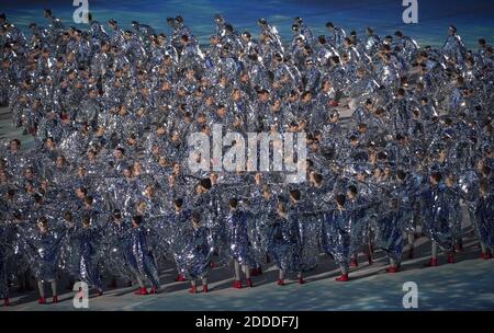 Performers in mirrored costumes flow through Fisht Stadium during the ...