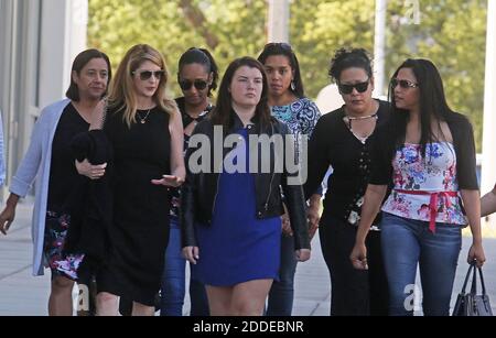 Barbara Poma, owner of the Pulse nightclub, is comforted by Florida Rep ...
