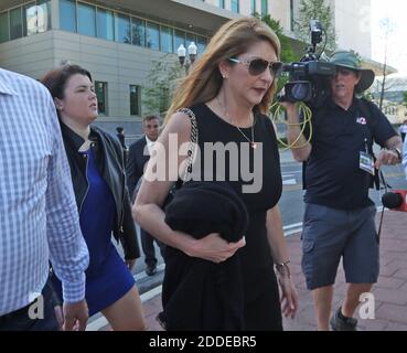 Barbara Poma, owner of the Pulse nightclub, is comforted by Florida Rep ...