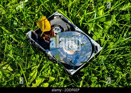 Crushed Hard Disk Drive on the Rust Metal Background closeup Stock ...