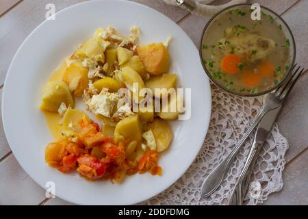 Fish aspic in a transparent bowl with potato Stock Photo - Alamy