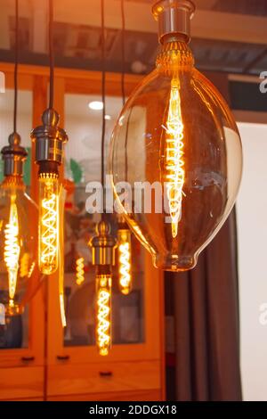 Classic retro incandescent led electric lamp warm white on blur ...