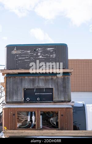 old discarded hot tubs ready for recycling Stock Photo - Alamy
