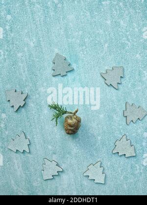 Flat lay composition with christmas trees on color background. Top view ...